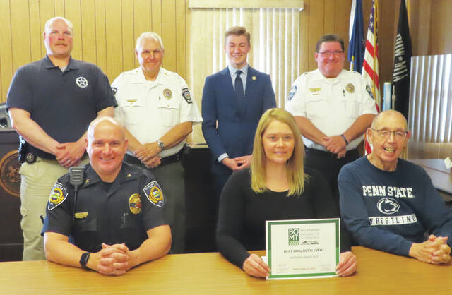 Pictured are members of the Mountain Top National Night Out planning ...